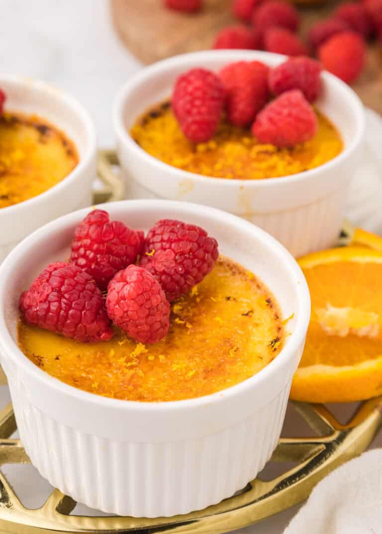 Honey-Orange Crème Brûlée with Raspberries (lighter creme brulee recipe ...